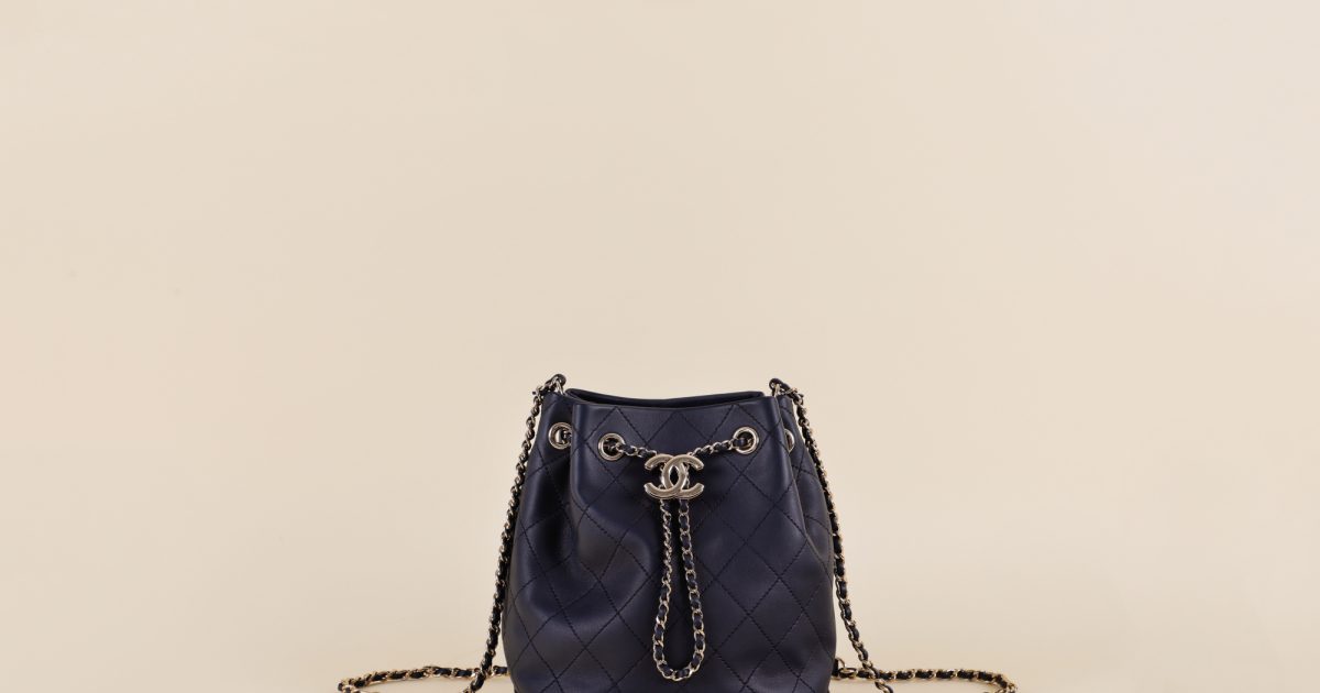 Chanel Stitched Chain CC Drawstring Bucket Bag | Vivrelle