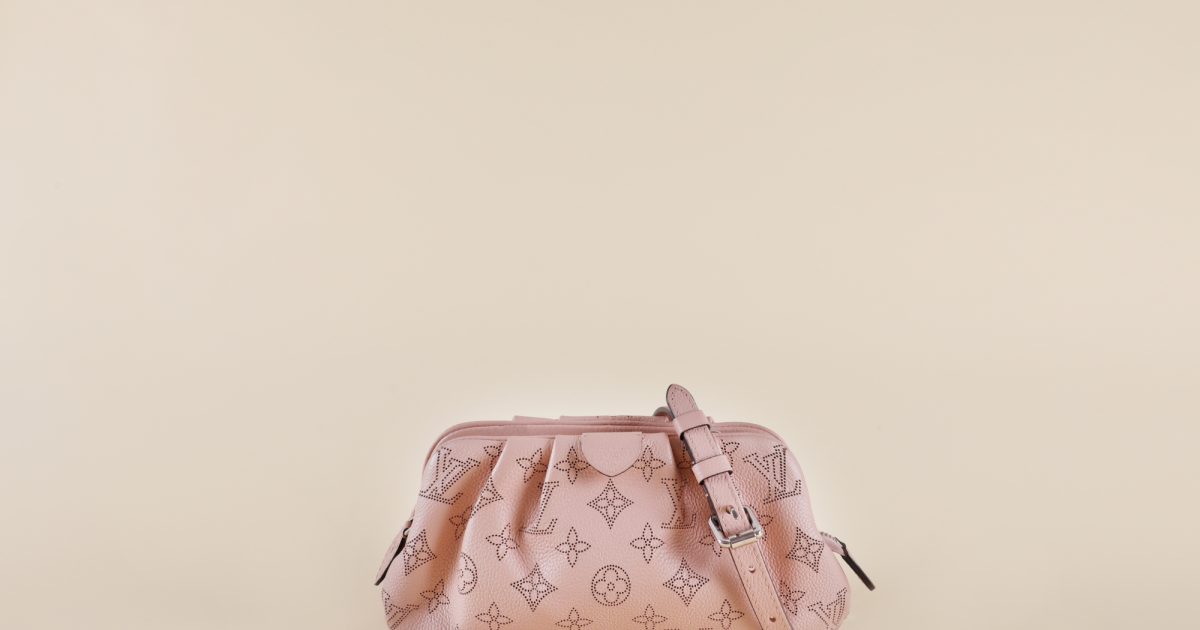 Louis Vuitton Monogram Mahina Scala Mini Pouch | Vivrelle